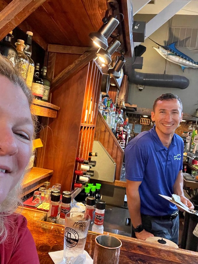 The bar at Striper Bites—where spirits flow freely and the staff looks genuinely happy to be there. A good sign for what's about to hit your plate.