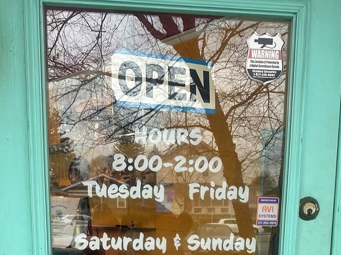 Hours posted like a promise: "Yes, we'll be here when you need us." The breakfast equivalent of a friend who never lets you down.