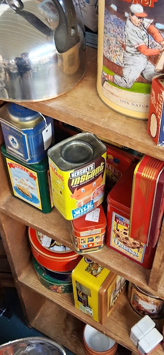 Vintage tins showcase the golden age of American advertising. That Hershey's container probably held someone's secret cookie stash in 1965—what will you store in it?