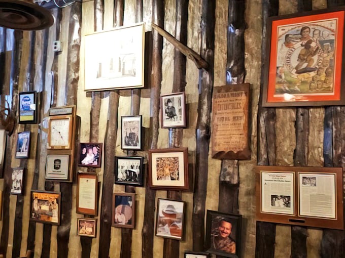Not just decoration—this wall tells stories of Tennessee traditions, famous visitors, and memories made over perfectly cooked steaks.