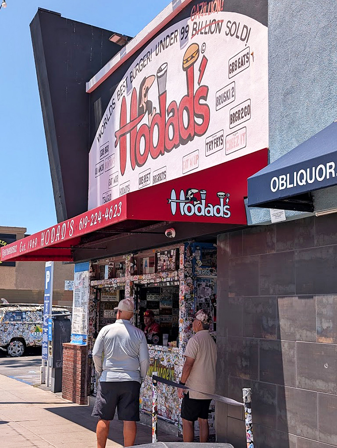 Hodad's wall of stickers and memorabilia isn't decoration – it's a visual history of burger pilgrims who came before you.