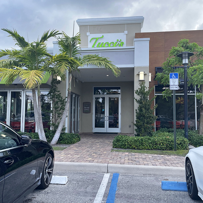 Tucci's modern exterior brings contemporary flair to traditional coal-fired pizza. Palm trees and pizza—a perfect Florida pairing.