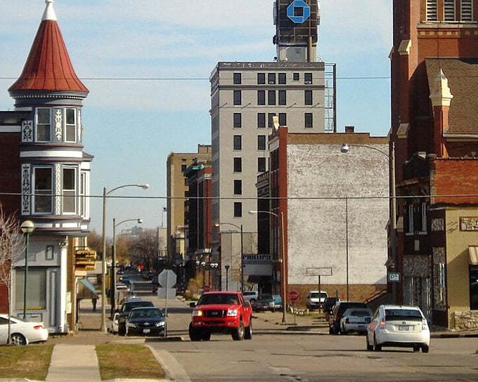 Colorful historic storefronts line downtown Moline, their vibrant facades housing restaurants and shops that blend yesterday's charm with today's tastes.