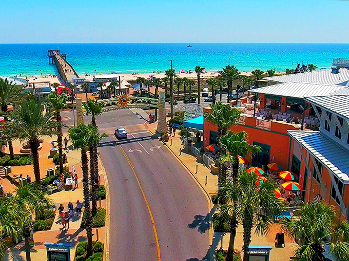 From above, Pier Park's colorful streets lead directly to turquoise waters, connecting shopping therapy with beach therapy in one convenient location.
