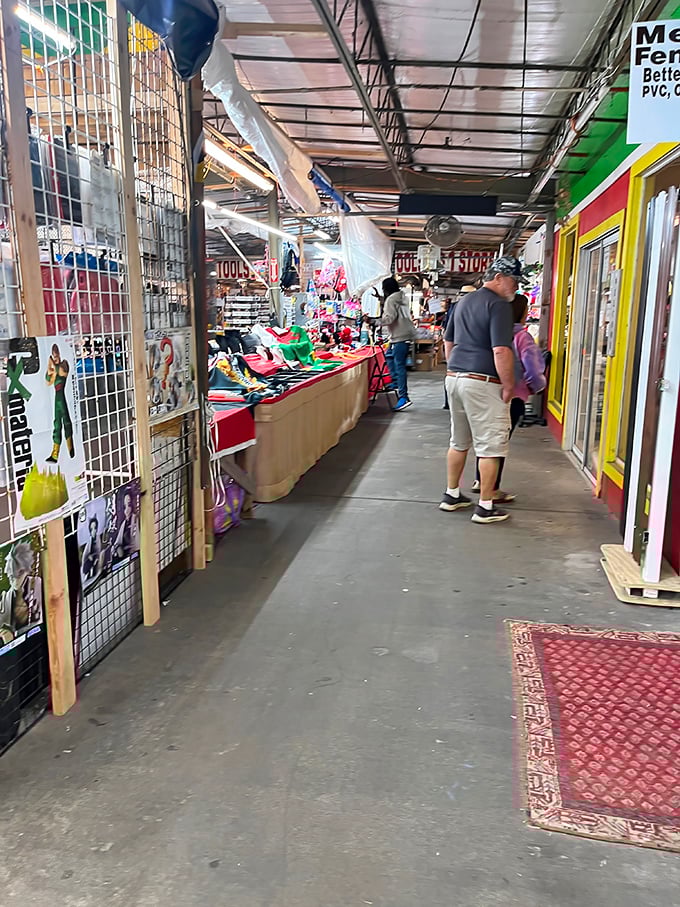 The modern bazaar experience – where shoppers stroll past colorful storefronts, each promising different treasures behind their humble facades.