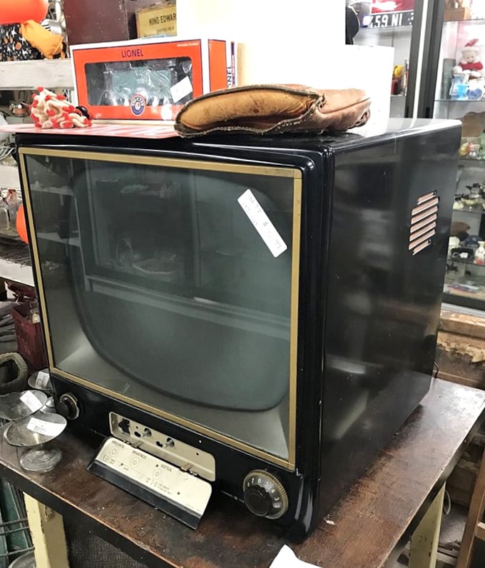 Before streaming and flat screens, families gathered around television cabinets like this—furniture first, entertainment center second.