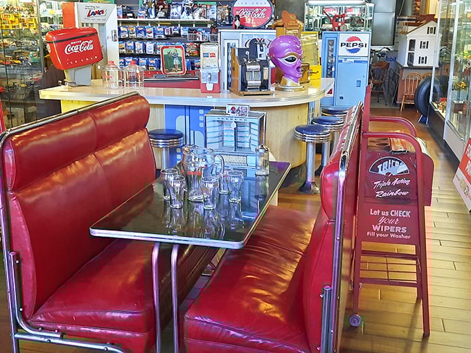 The classic American diner booth—where countless first dates, family meals, and road trip pit stops created memories over chocolate malts.