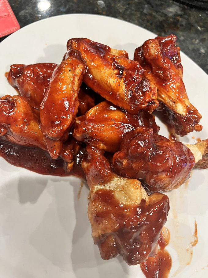 These wings aren't messing around – glossy, sticky, and guaranteed to require at least three napkins and zero regrets.