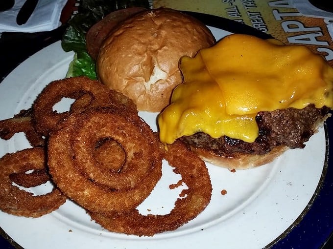 A burger that doesn't need filters or special lighting to look good. That melted American cheese blanket is comfort food defined.