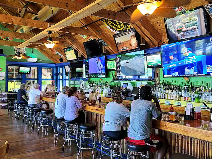 The bar area—where strangers become friends over cold beers and shared stories of the "biggest crab I ever caught."