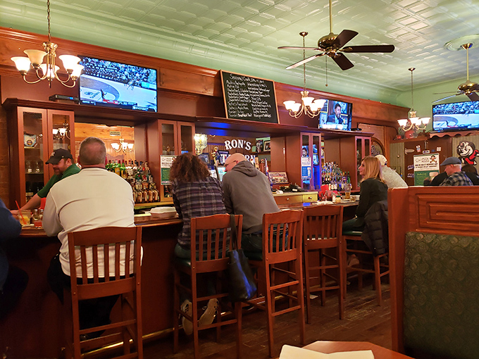 The bar area transforms into sports central when Ohio teams play, where strangers become temporary best friends over cold beers and shared victories.