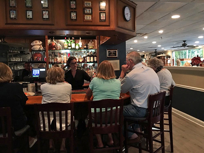 The bar area invites you to pull up a stool, make a new friend, and discover why Florida's happy hour culture deserves its legendary status.