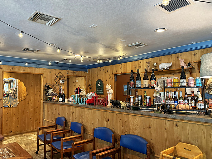 A bar stocked with the essentials, because when you're serving food this good, you don't need fancy mixologists – just cold beer and honest pours. 