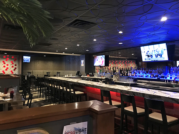 A bar that understands the importance of proper lighting – making both the bottles and their admirers look equally impressive.
