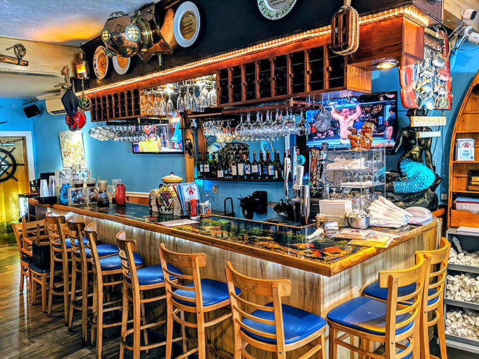 The bar isn't just serving drinks—it's offering liquid courage for those about to battle a whole Maine lobster for the first time.