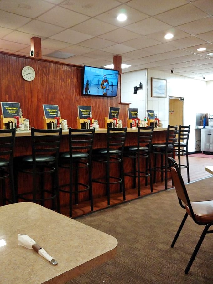 The counter seats—where solo diners become part of the diner family and servers know your order before you sit down.