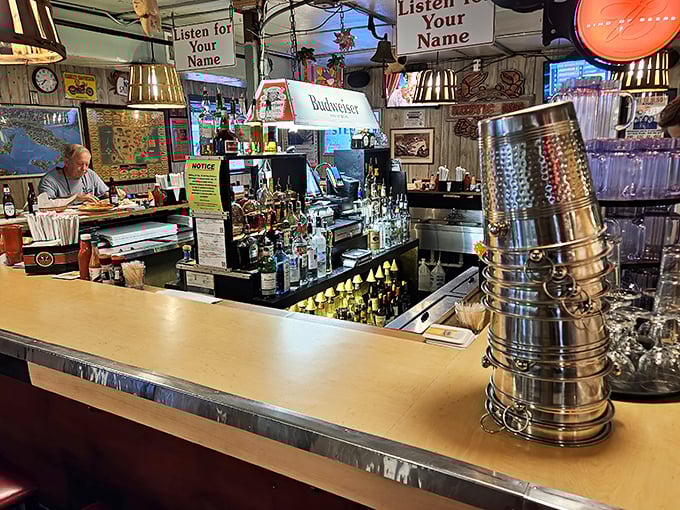 The bar where "Listen for Your Name" signs remind you that good things come to those who wait—especially seafood.