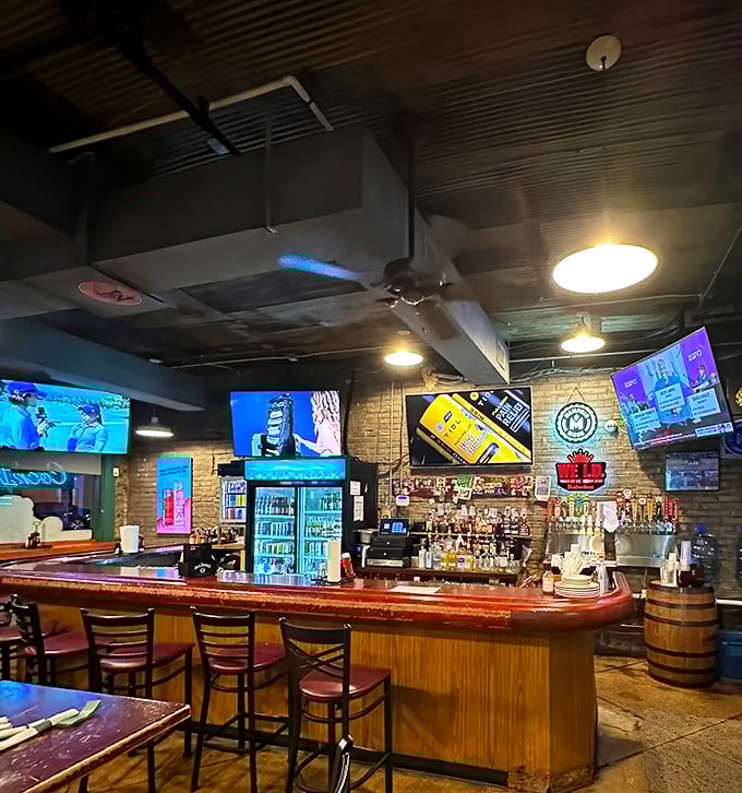 The bar area hums with anticipation—each bottle a potential ingredient in your perfect Memphis evening.