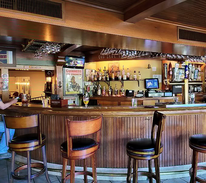 The bar beckons with promises of proper pints and conversation. Those Guinness taps aren't just for show – they're portals to Dublin in a glass.