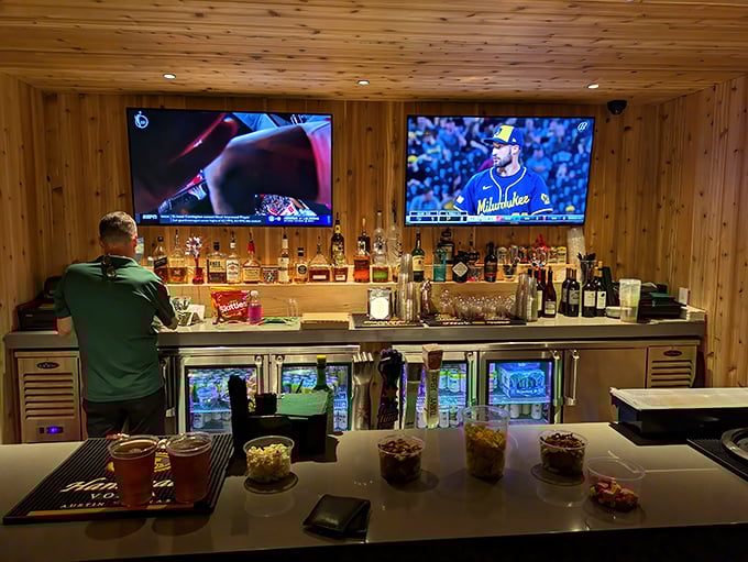 This isn't just a bar – it's a shrine to conviviality where sports on TV, amber bottles, and the promise of perfect cocktails create Wisconsin's version of paradise.