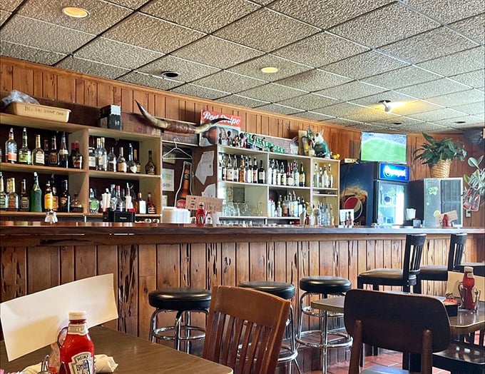 The bar area – where Pittsburgh sports history decorates the walls and the bartenders remember your usual before you've fully settled onto your stool. 