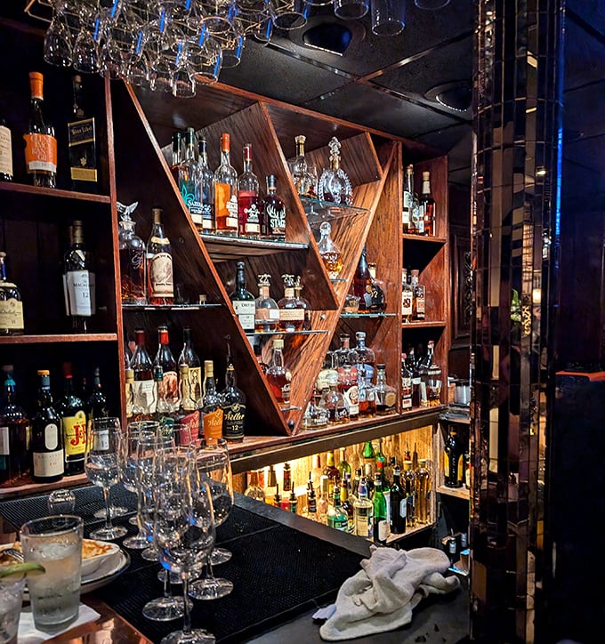 Behind this bar, bottles aren't just ingredients – they're supporting actors in the culinary theater that unfolds nightly at The Top.