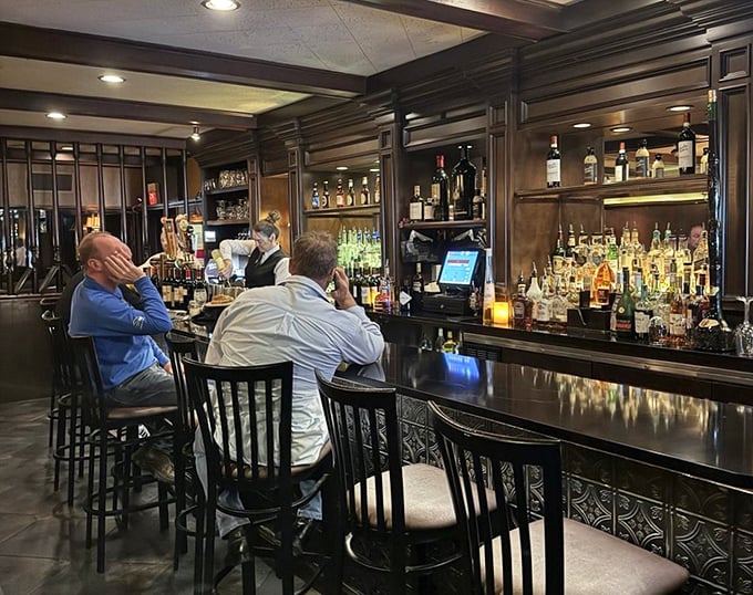 The bar area – where strangers become friends and friends become family over perfectly mixed cocktails and shared stories.
