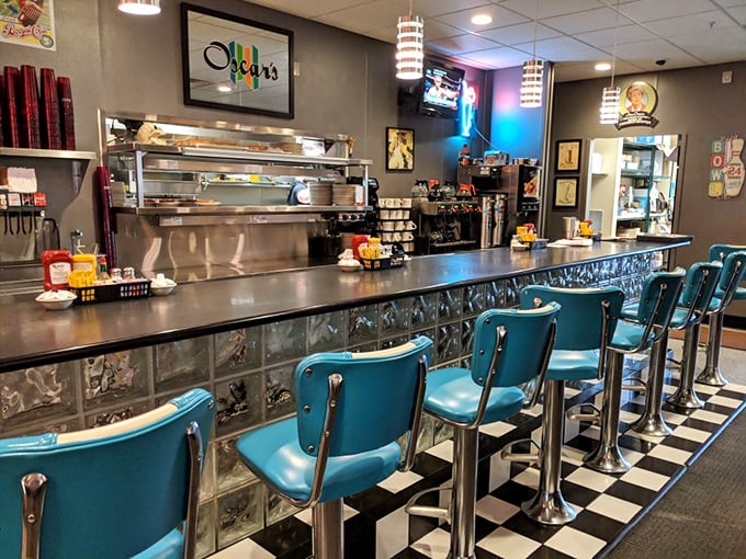 The counter where breakfast dreams come true. Those turquoise chairs aren't just seating – they're time machines to a simpler, more delicious era.