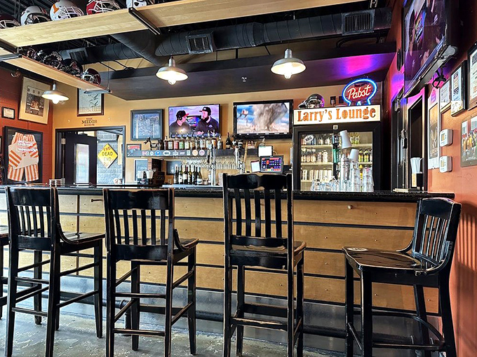 Larry's Lounge isn't just a bar—it's a sanctuary where barbecue pilgrims can toast their good fortune with a cold one after a smoky feast.