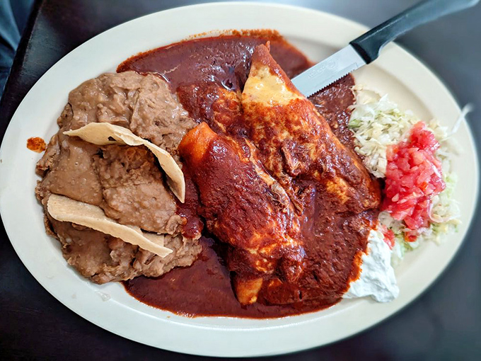 These beef enchiladas don't just sit in their sauce – they've been marinating in family tradition and neighborhood history for decades.