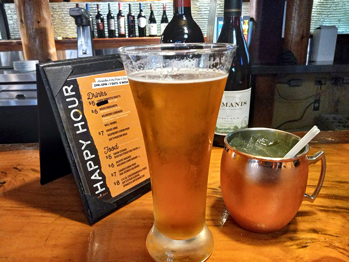Happy hour done right—a tall, cold beer alongside a copper mug Moscow Mule. This duo has probably launched more great conversations than a therapist's couch.