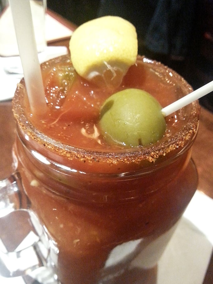Their Bloody Mary arrives like a spicy liquid salad – those olives aren't just garnish, they're a statement of cocktail commitment.
