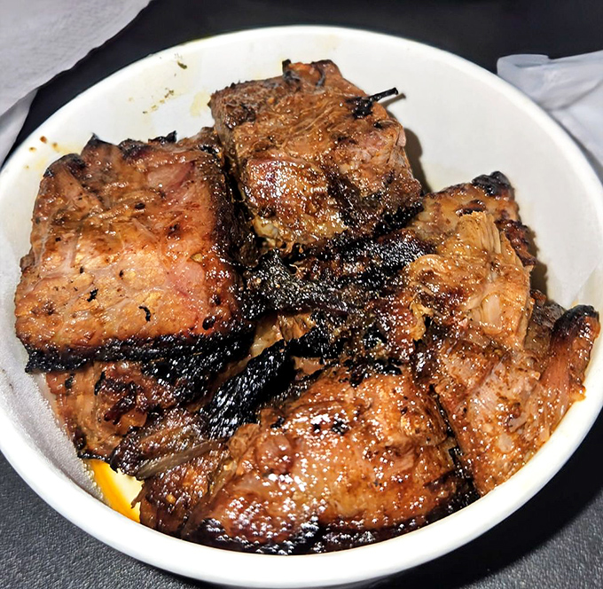 Burnt ends—the barbecue world's equivalent of winning the lottery—glistening with a bark so perfect it deserves its own fan club.