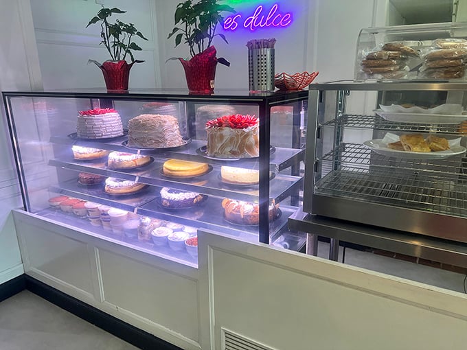 The dessert case that makes willpower disappear faster than a snowbird in July. Each cake and pastry whispers sweet nothings to passing diners.