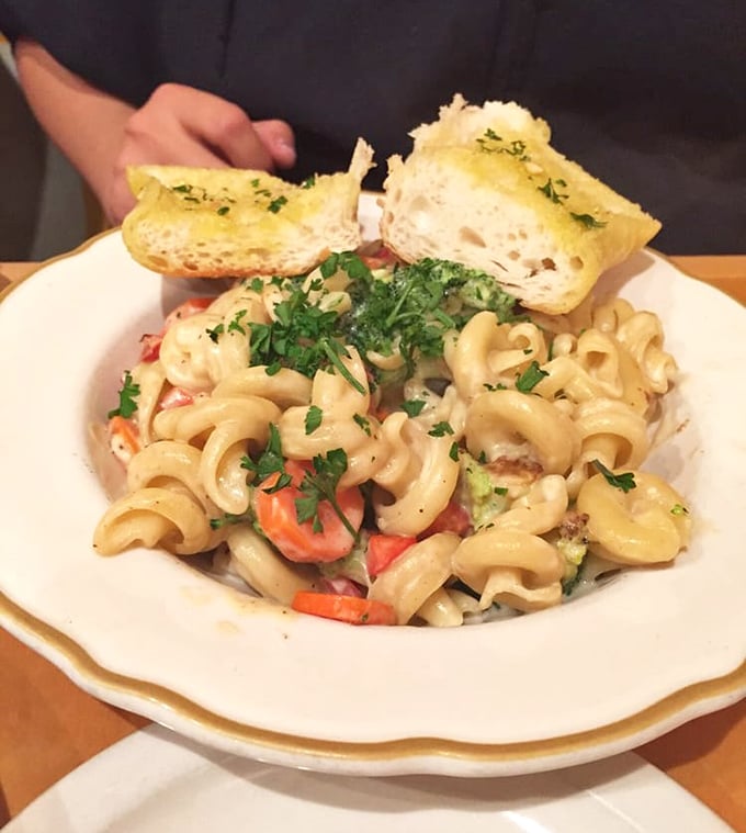 Campanella pasta that cradles the creamy sauce in its curls – comfort food that doesn't announce its plant-based credentials, it just delivers satisfaction.