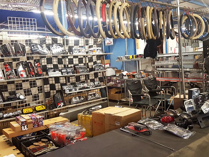 An automotive paradise where steering wheels hang like exotic fruit and accessories await their forever vehicles.