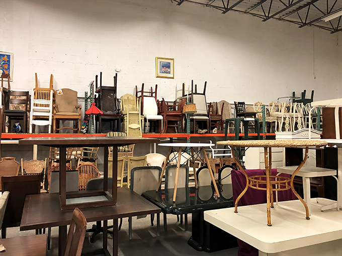Chairs upon chairs create a sculptural installation of seating possibilities, a testament to humanity's endless quest for the perfect place to sit.