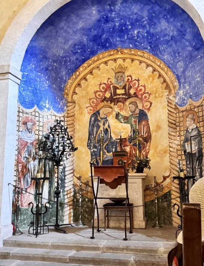 The castle chapel's vibrant frescoes and ornate altar offer a moment of reverent beauty—and perhaps a prayer that your credit card survives the gift shop.