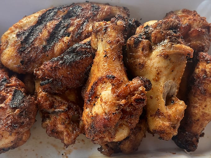 These aren't just chicken wings—they're flavor vehicles with a perfect char that makes you wonder why you ever bothered with other food groups.