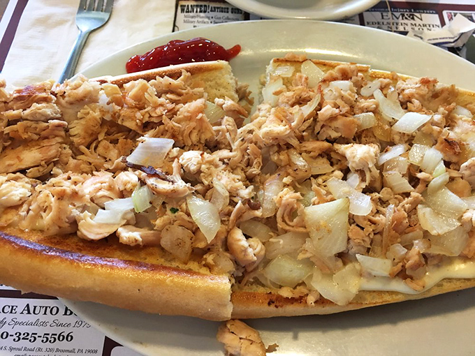 The chicken cheesesteak: Pennsylvania's casual masterpiece. Tender chicken and caramelized onions on a perfect roll—no fancy explanation needed, just enjoyment.