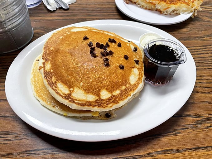 A chocolate chip pancake that makes you question why anyone would ever eat plain ones again—golden, fluffy, and studded with melty chocolate treasures.
