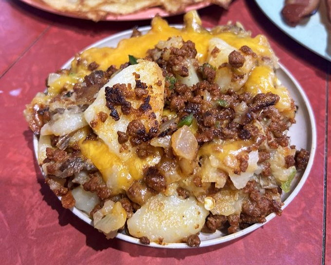 The chorizo hash – a savory mountain of breakfast bliss topped with melted cheese that makes Monday mornings bearable again.