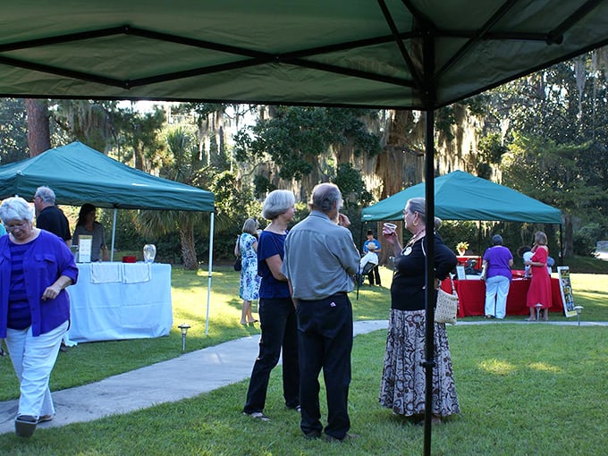 Community gatherings under Spanish moss—where conversations flow as easily as the sweet tea being served.