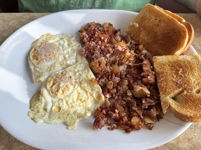 Corned beef hash with perfectly cooked eggs—the breakfast of champions, or at least the breakfast of people who appreciate proper seasoning.