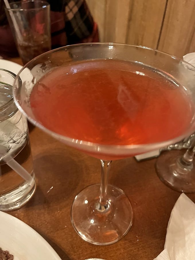 This isn't just a cosmopolitan – it's liquid ruby that makes conversation flow as smoothly as it does down your throat.