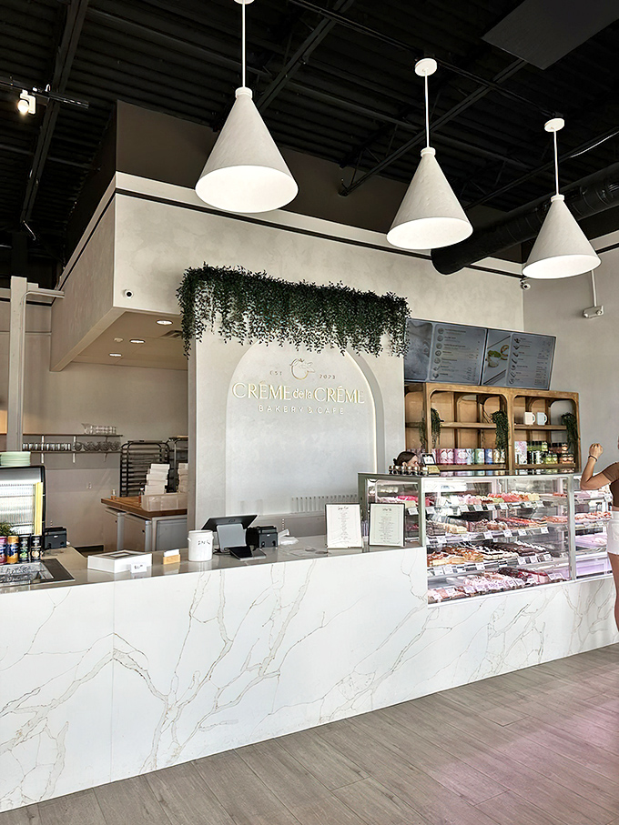 Clean lines, hanging plants, and that signature marble counter create the perfect backdrop for your "I'm living my best life" social media moment.