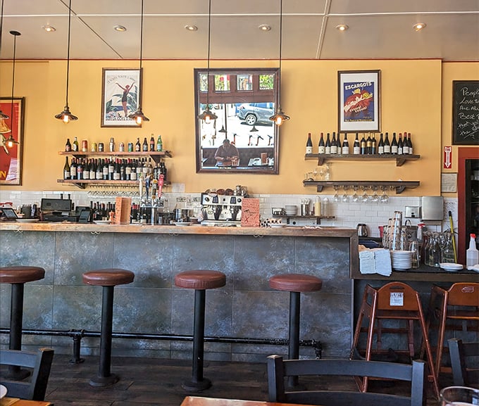 The bar area: where wine bottles stand at attention, ready to complement whatever delicious decision you've just made.