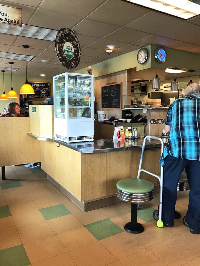 The counter view offers a glimpse into diner democracy – where everyone gets equal access to coffee refills and friendly conversation.