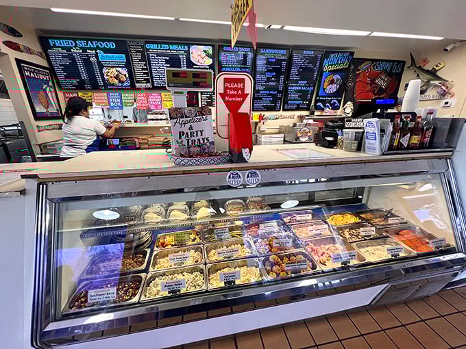 Behind this counter, seafood alchemy happens daily—turning simple ingredients into gold through the ancient magic of knowing exactly what you're doing.