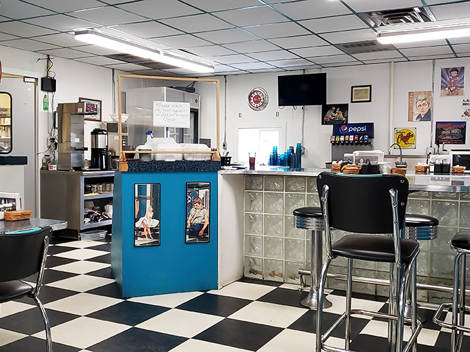 A row of empty stools just waiting for hungry patrons—like front-row seats to the greatest comfort food show on earth.